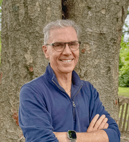 Copeland in front of tree – Charlie Copeland Consulting